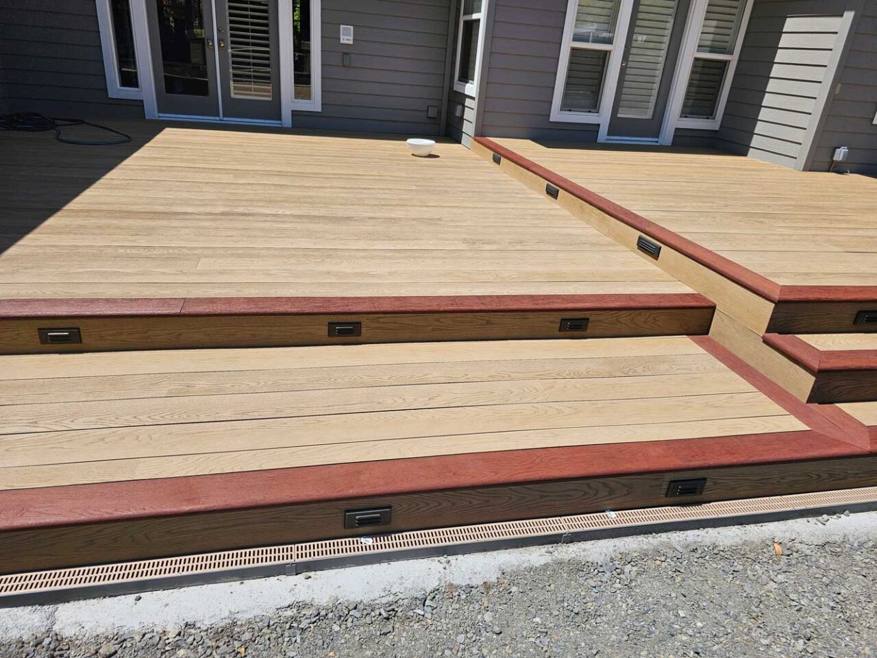 Millboard Golden Oak with Jarrah Bullnose | Deckmaster Fine Decks